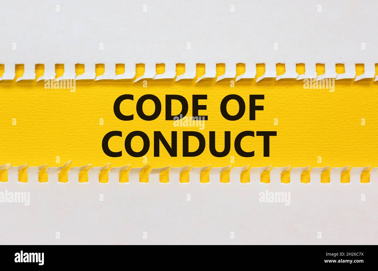 Code Of Conduct Symbol White And Yellow Paper With Words Code Of
