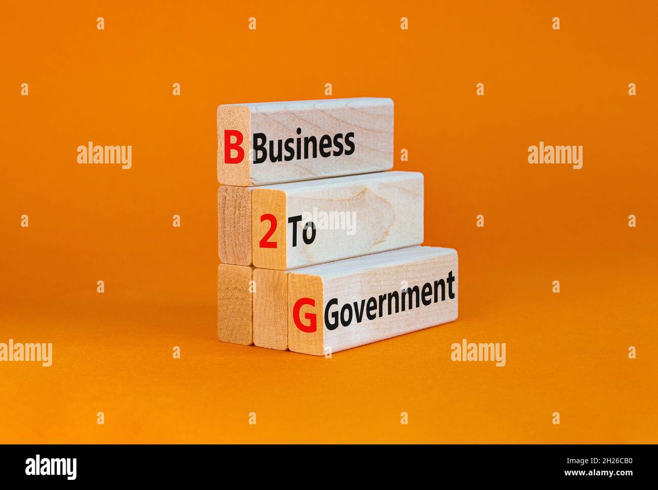 B2G business to government symbol. Concept words 'B2G - business to government' on wooden blocks ...