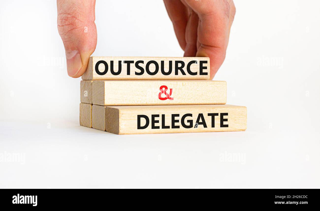 Outsource and delegate symbol. Concept words 'Outsource and delegate ...
