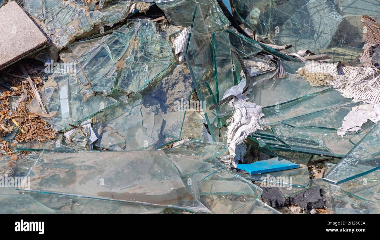 Big Bunch of Broken Glass Windows Debris Damage Stock Photo - Alamy
