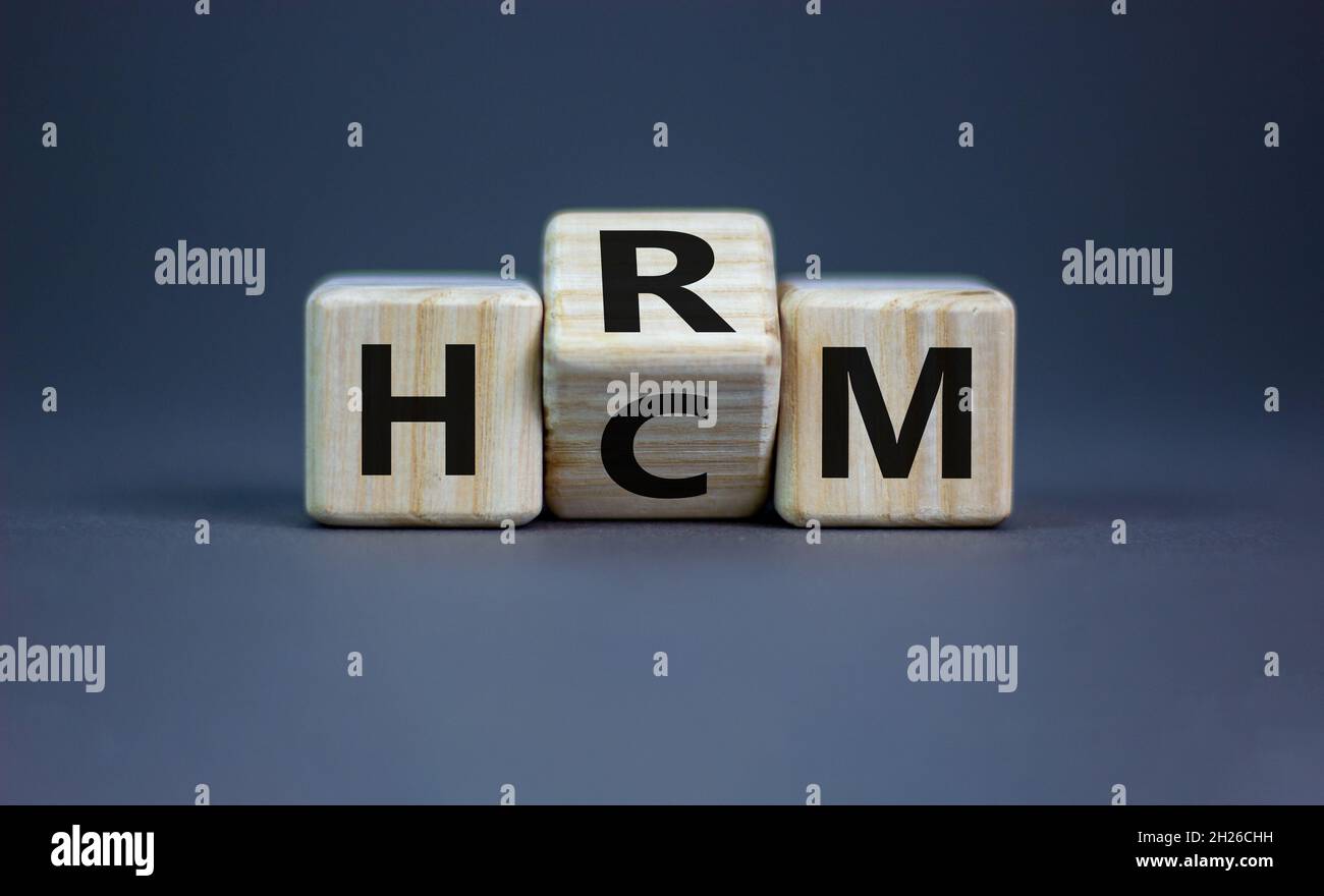 Human resource and capital management symbol. Turned wooden cubes and ...