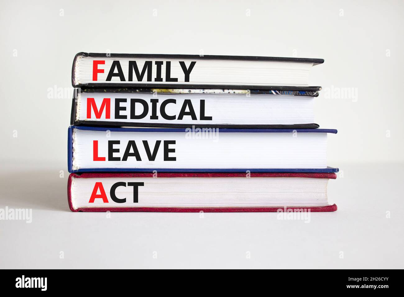 FMLA, family medical leave act symbol. Concept words 'FMLA, family ...