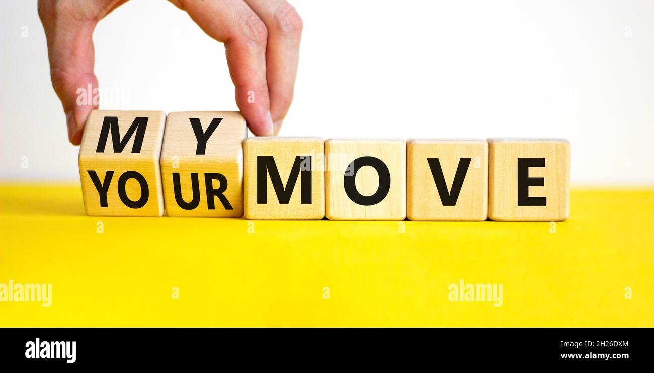 My or your move symbol. Businessman turns wooden cubes and changes ...