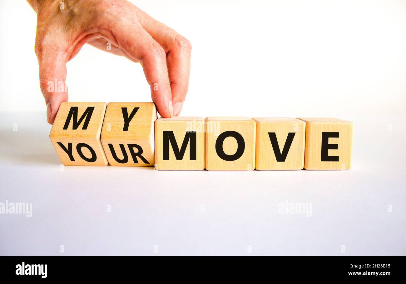 My or your move symbol. Businessman turns wooden cubes and changes ...