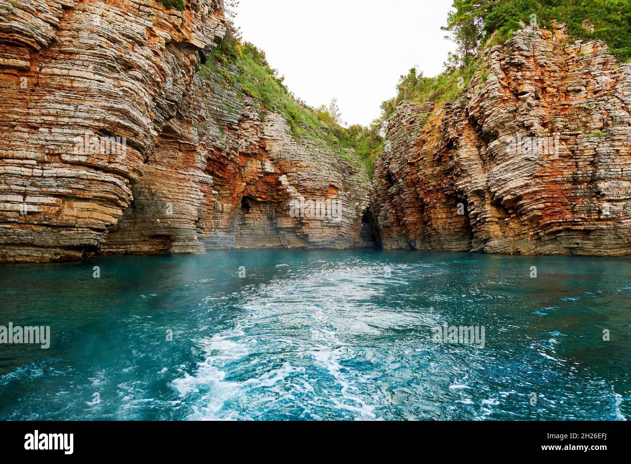 Exotic tropical lagoon with cave and cliff. Beauty seashore and asian ...
