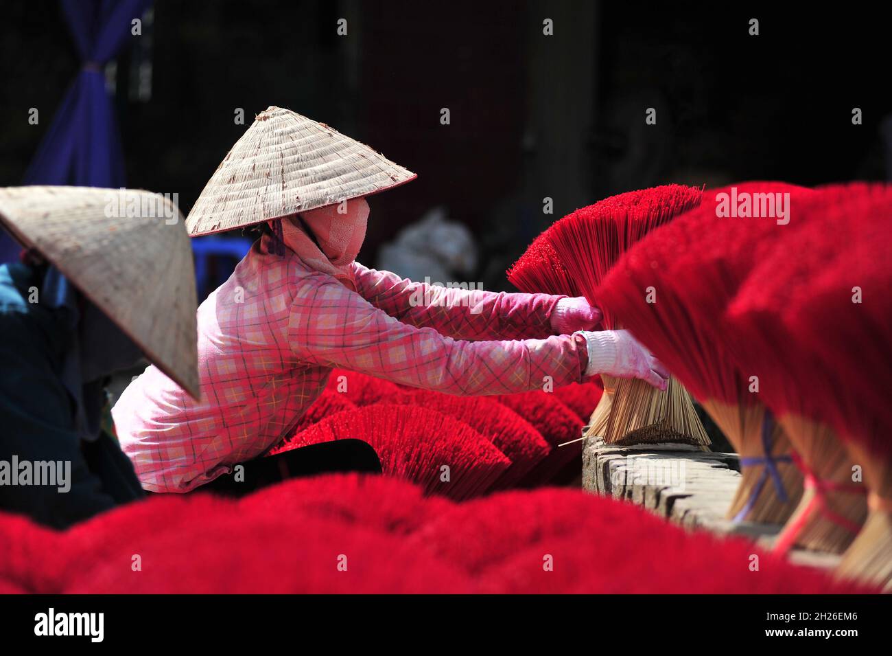 Woman red incense hi-res stock photography and images - Alamy