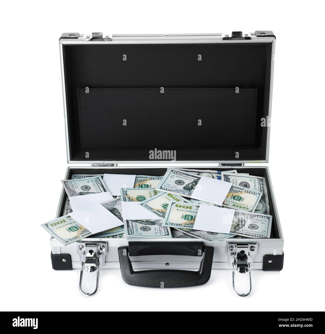 Open suitcase full of money on white background Stock Photo - Alamy