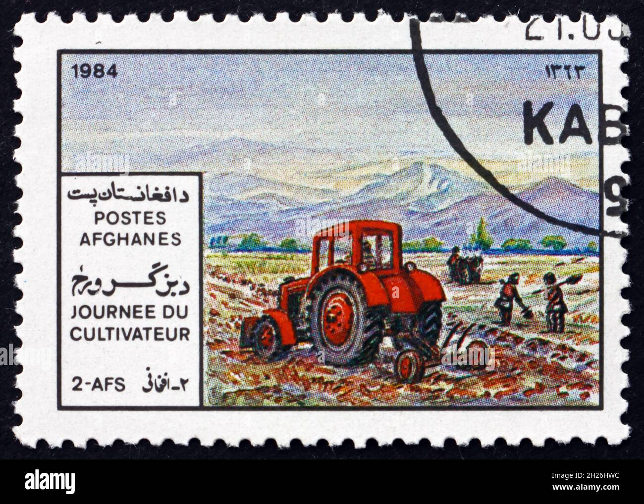 AFGHANISTAN - CIRCA 1984: a stamp printed in Afghanistan shows tractor ...