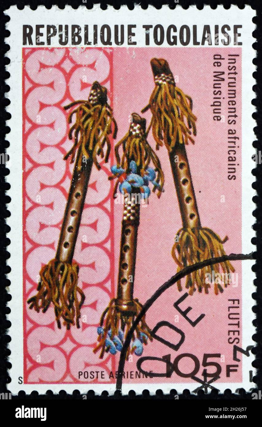 TOGO - CIRCA 1977: a stamp printed in Togo shows flutes, musical ...