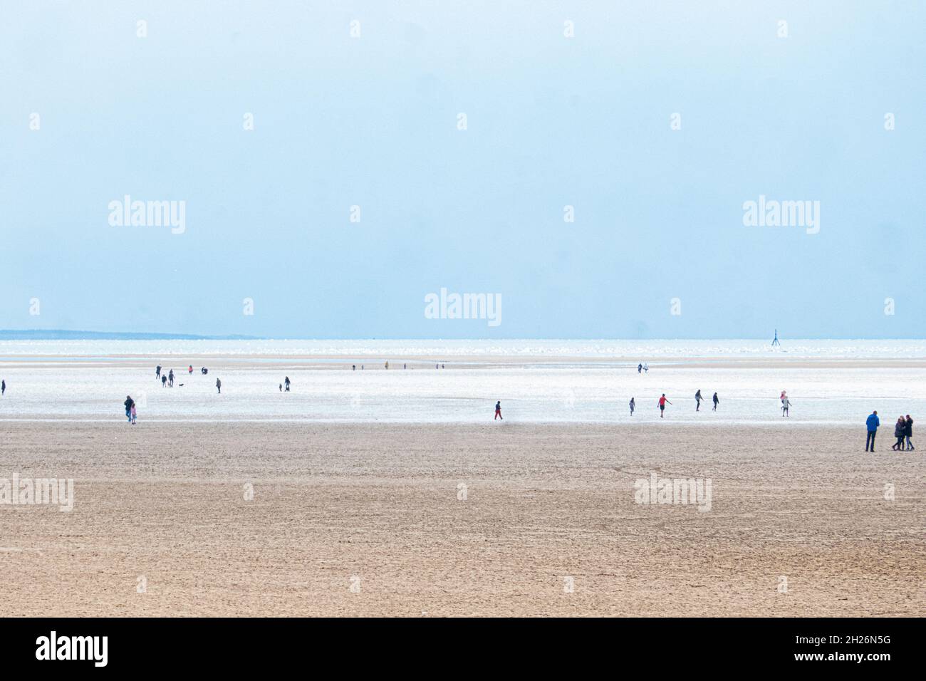 Lowry On The Beach Stock Photo - Alamy