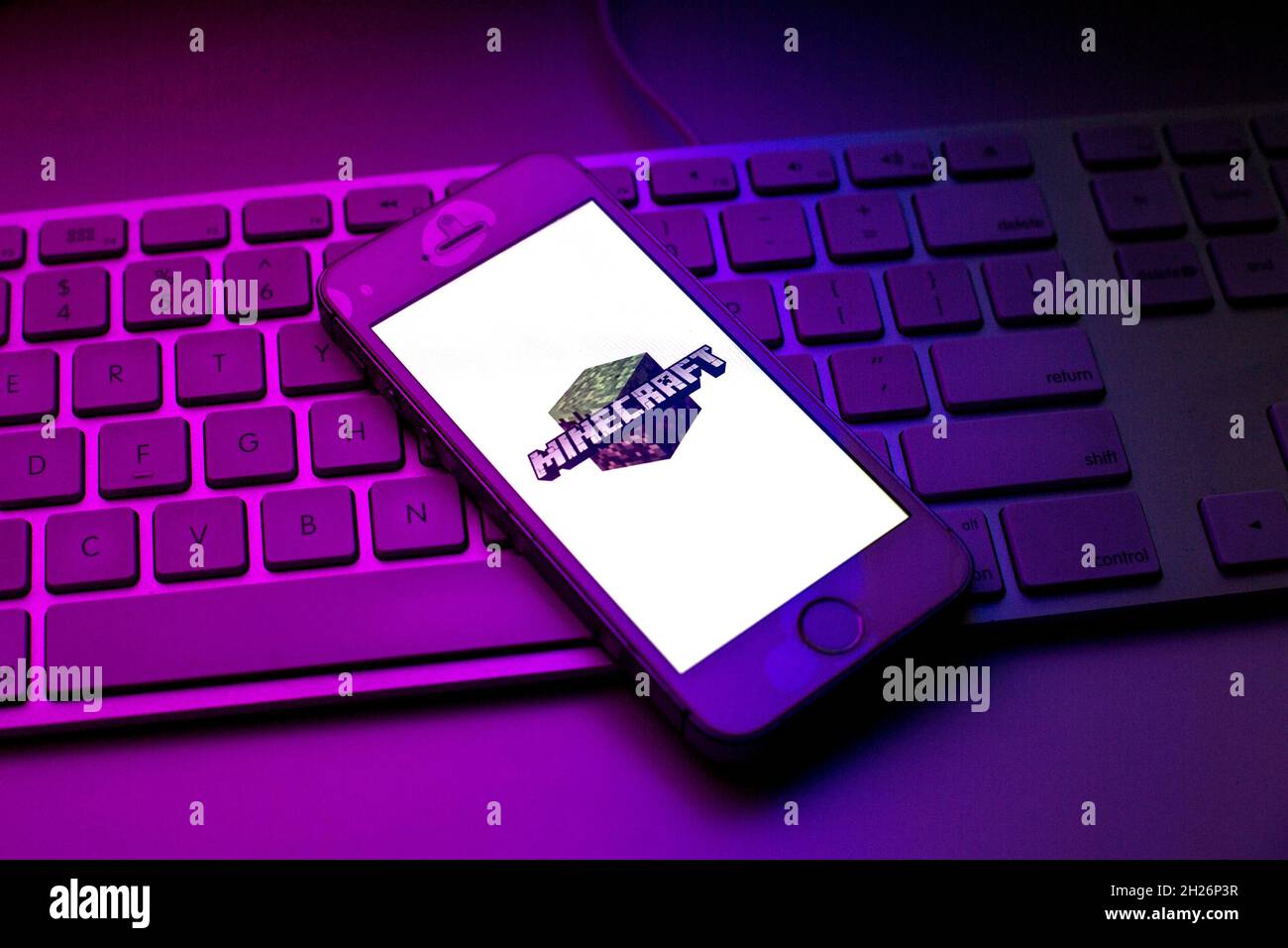 In this photo illustration a Minecraft logo seen displayed on a ...