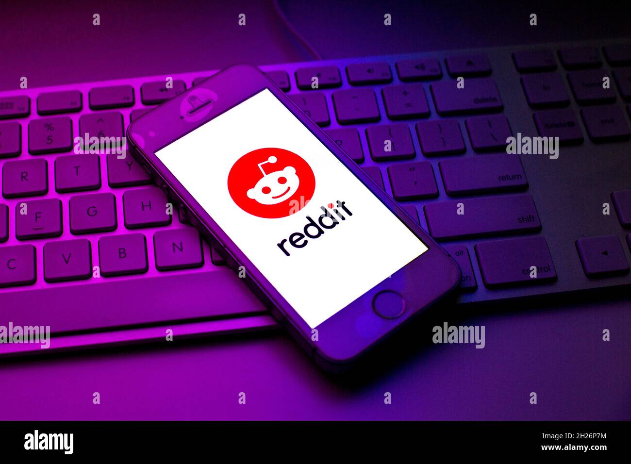 In this photo illustration a Reddit logo seen displayed on a smartphone ...