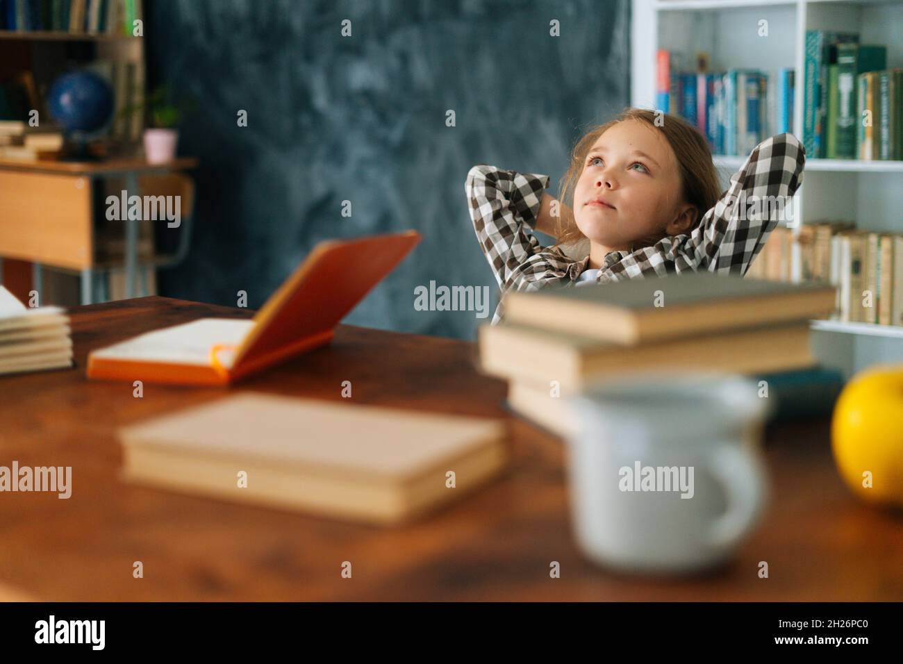 Child girl looking distance back hi-res stock photography and images ...