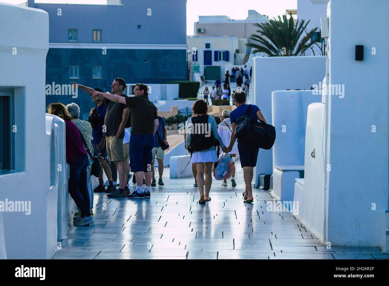 Santorini, Oia, Greece - October 18, 2021 Crowd of tourists visiting ...