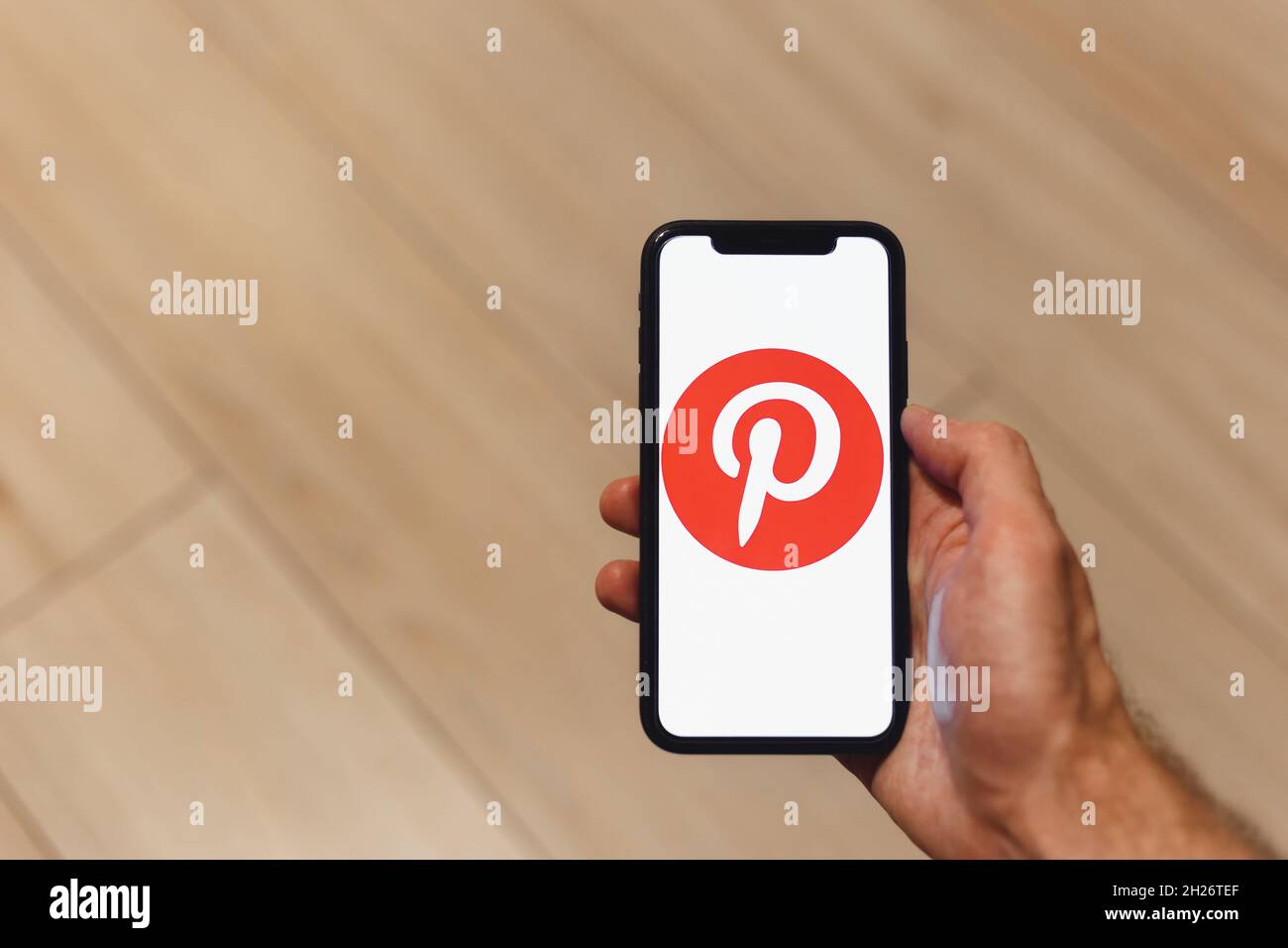 Minsk, Belarus - October 20, 2021: Man hands holding iphone with ...