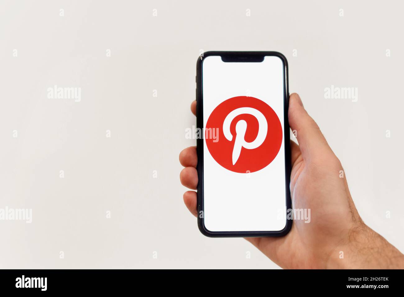 Minsk, Belarus - October 20, 2021: Man hands holding iphone with ...