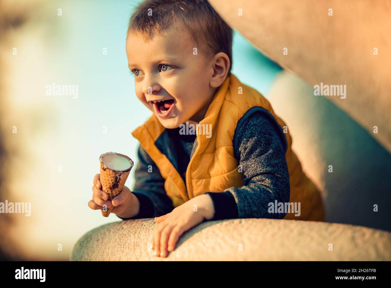 Kid eating ice cream hi-res stock photography and images - Alamy