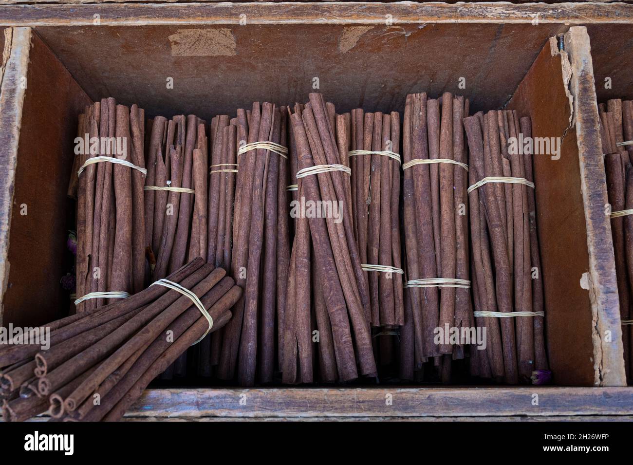 long sticks of cinnamon sold in bundles in a spice market Stock Photo ...