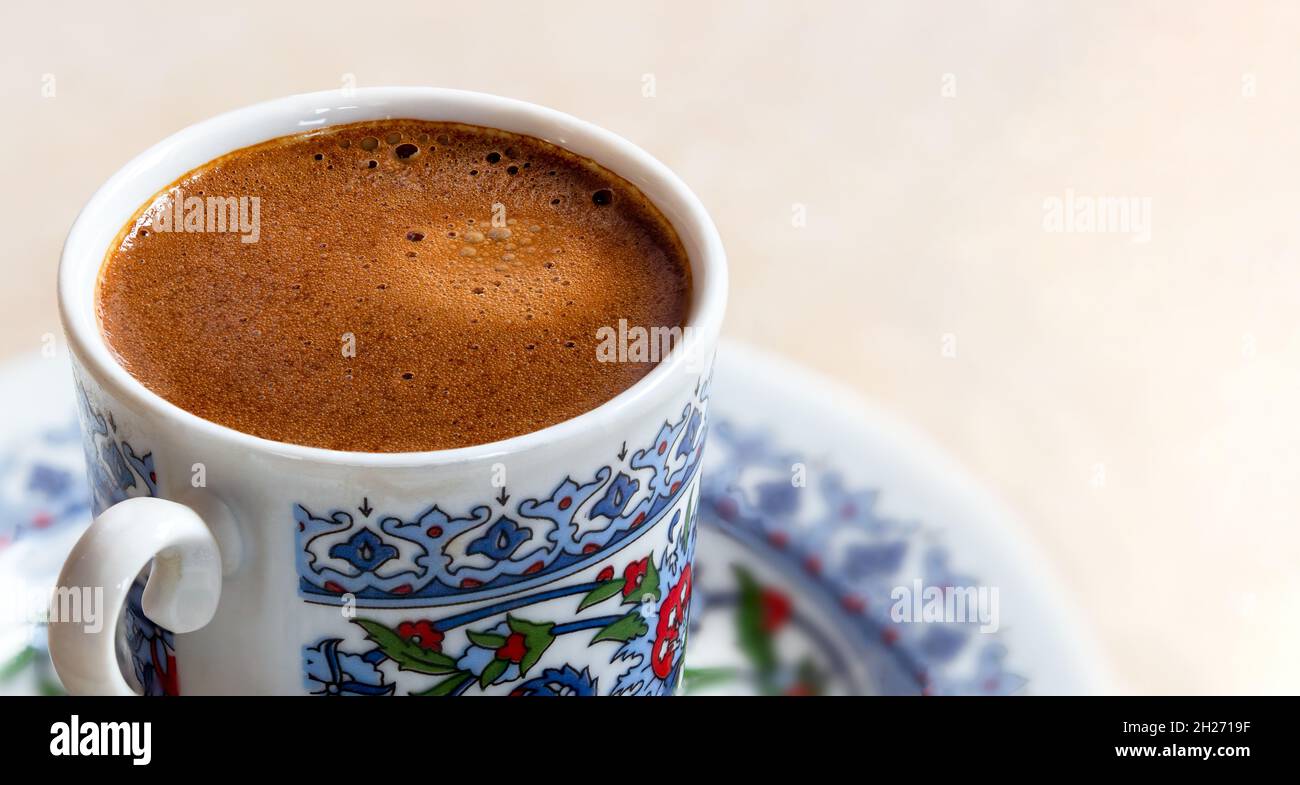 Top view photo of traditional turkish coffee with bubbles on isolated ...
