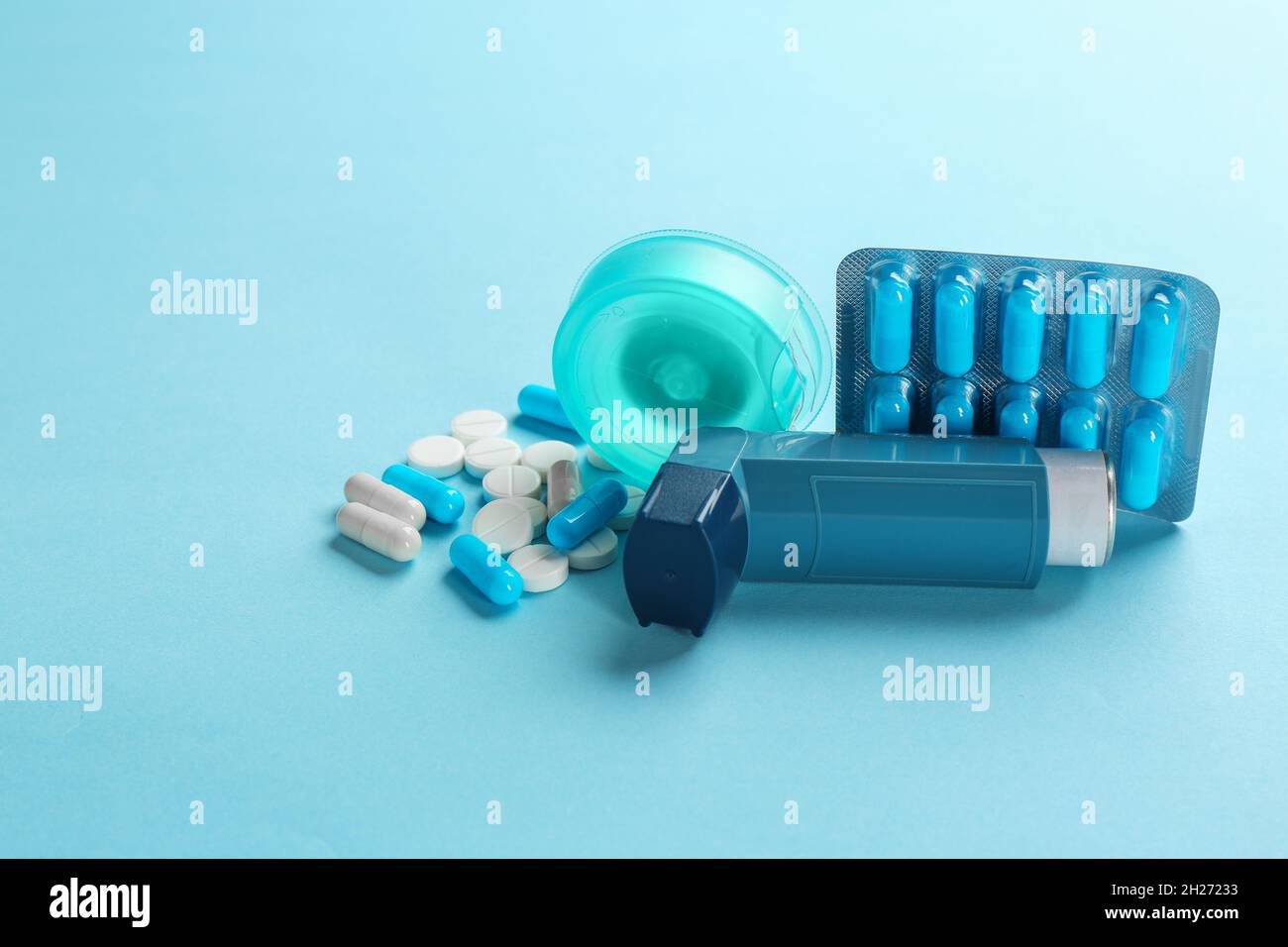 Set of asthma medications on color background Stock Photo - Alamy
