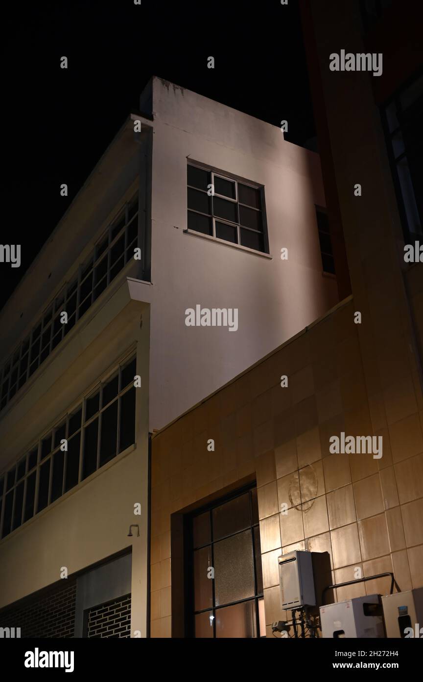 Closeup of a high rise building at night Stock Photo - Alamy