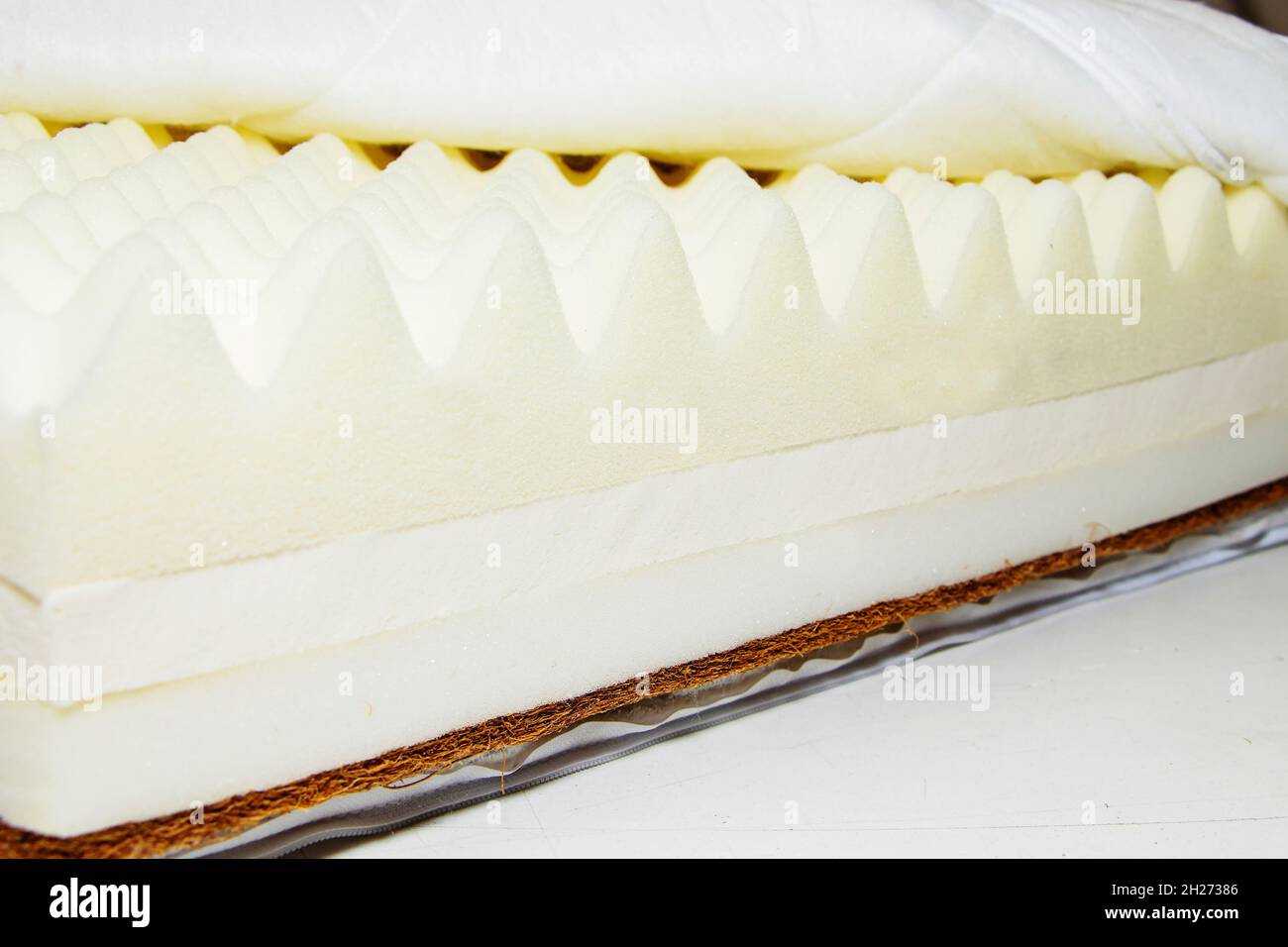 White sponge mattress material close-up. Inside the mattress Stock ...