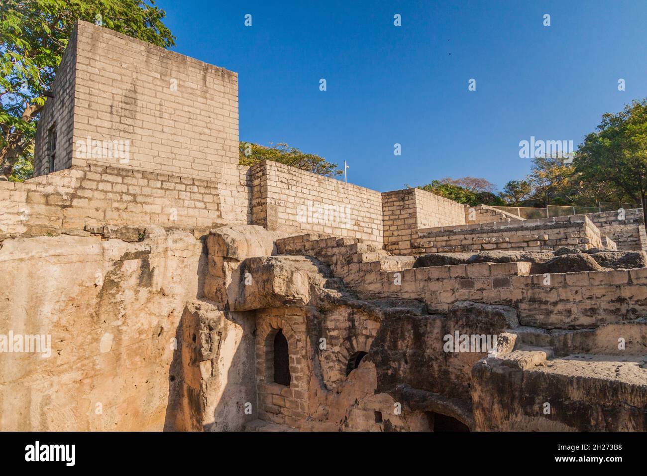 Ruins of Buddhist caves at Uparkot Fort in Junagadh, Gujarat state ...