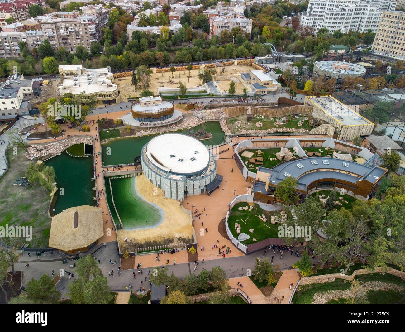 City aerial look down view on Kharkiv zoo park surrounded by greenery ...