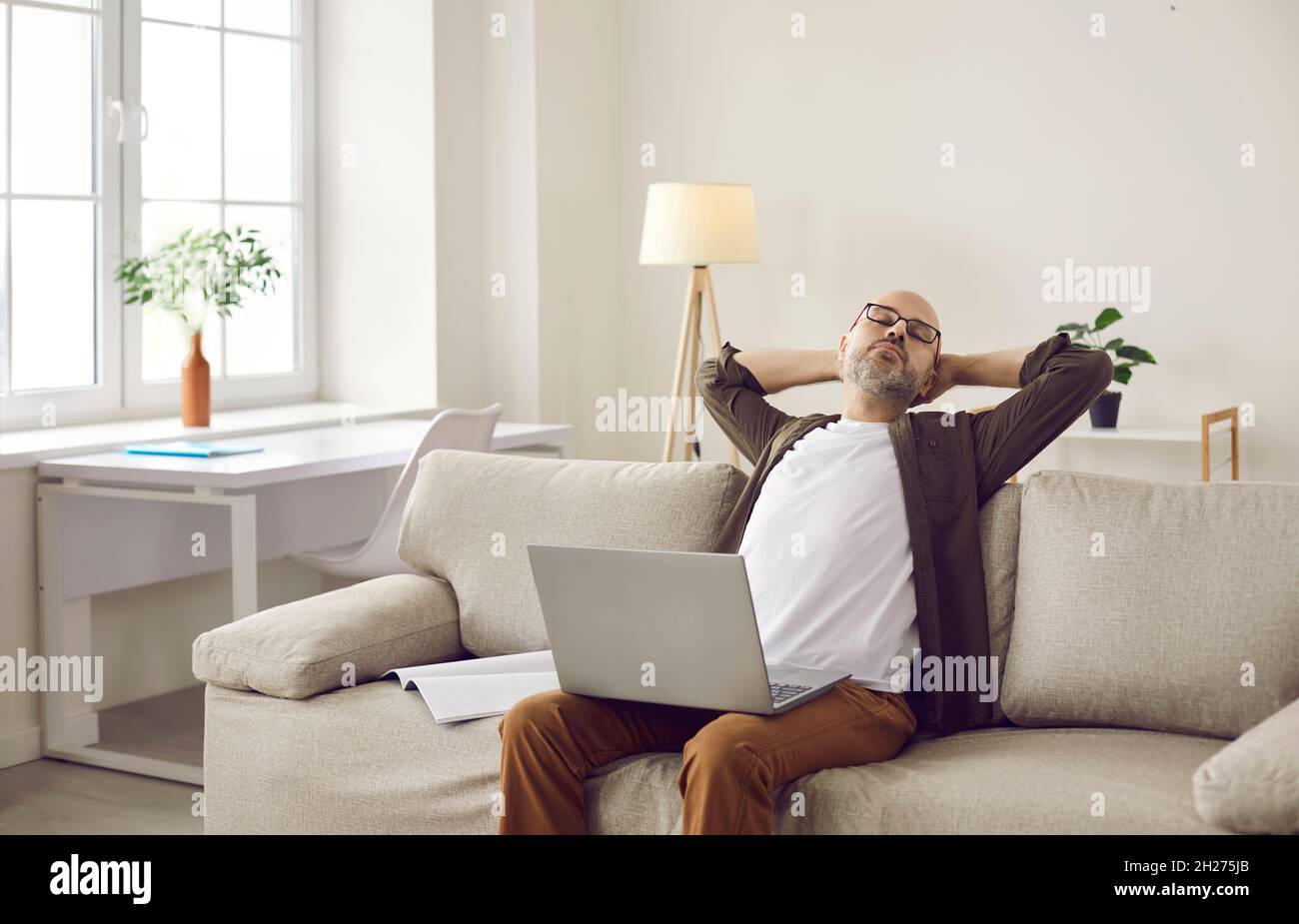 Tired man have break from computer job sleeping Stock Photo - Alamy