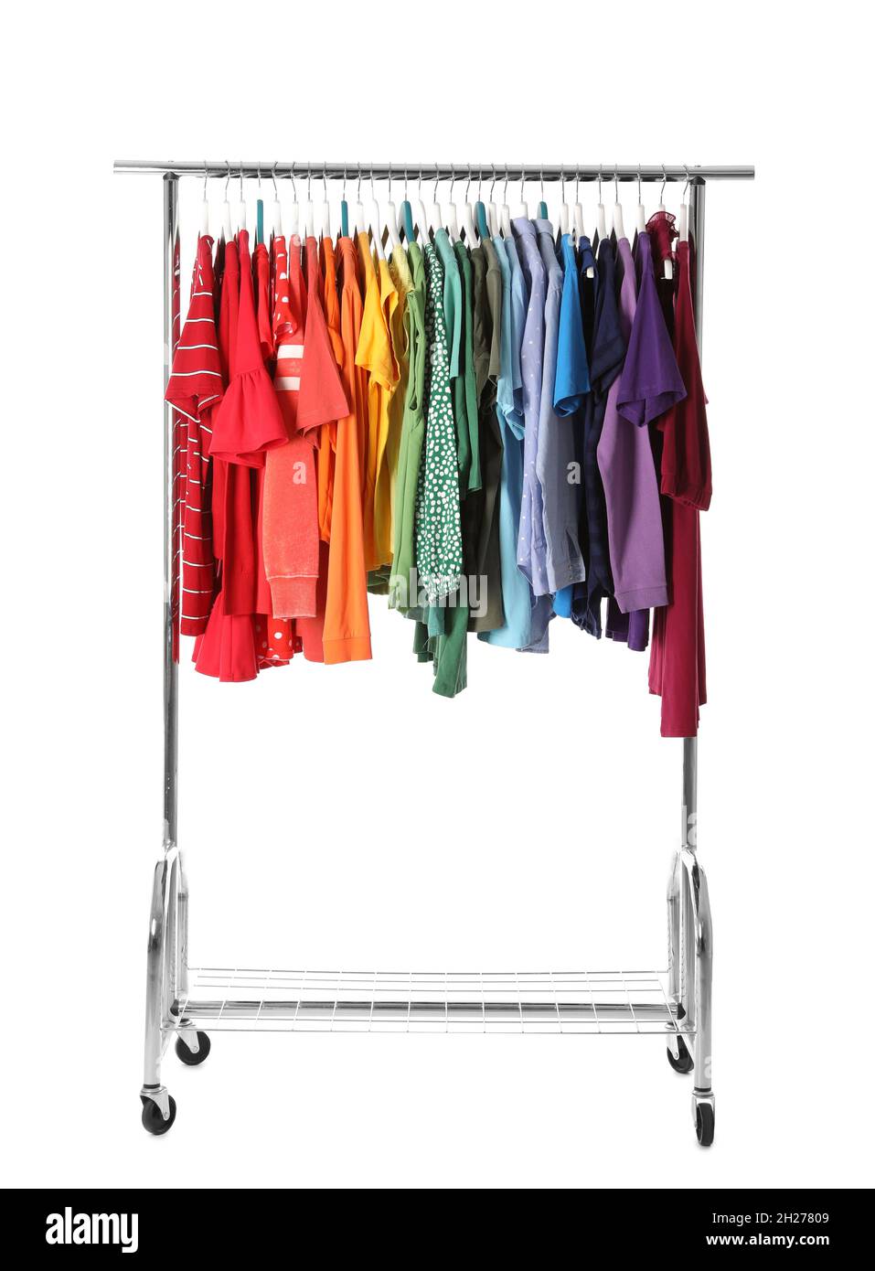Wardrobe rack with different colorful clothes on white background Stock ...
