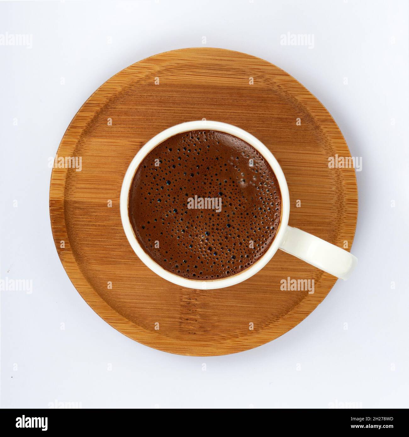 Top view photo of traditional turkish coffee with bubbles on isolated ...