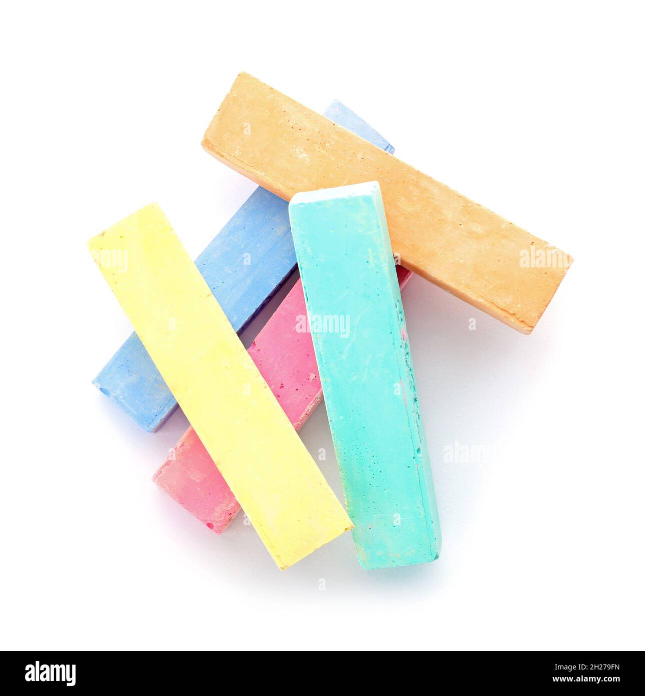 Color pieces of chalk on white background Stock Photo - Alamy