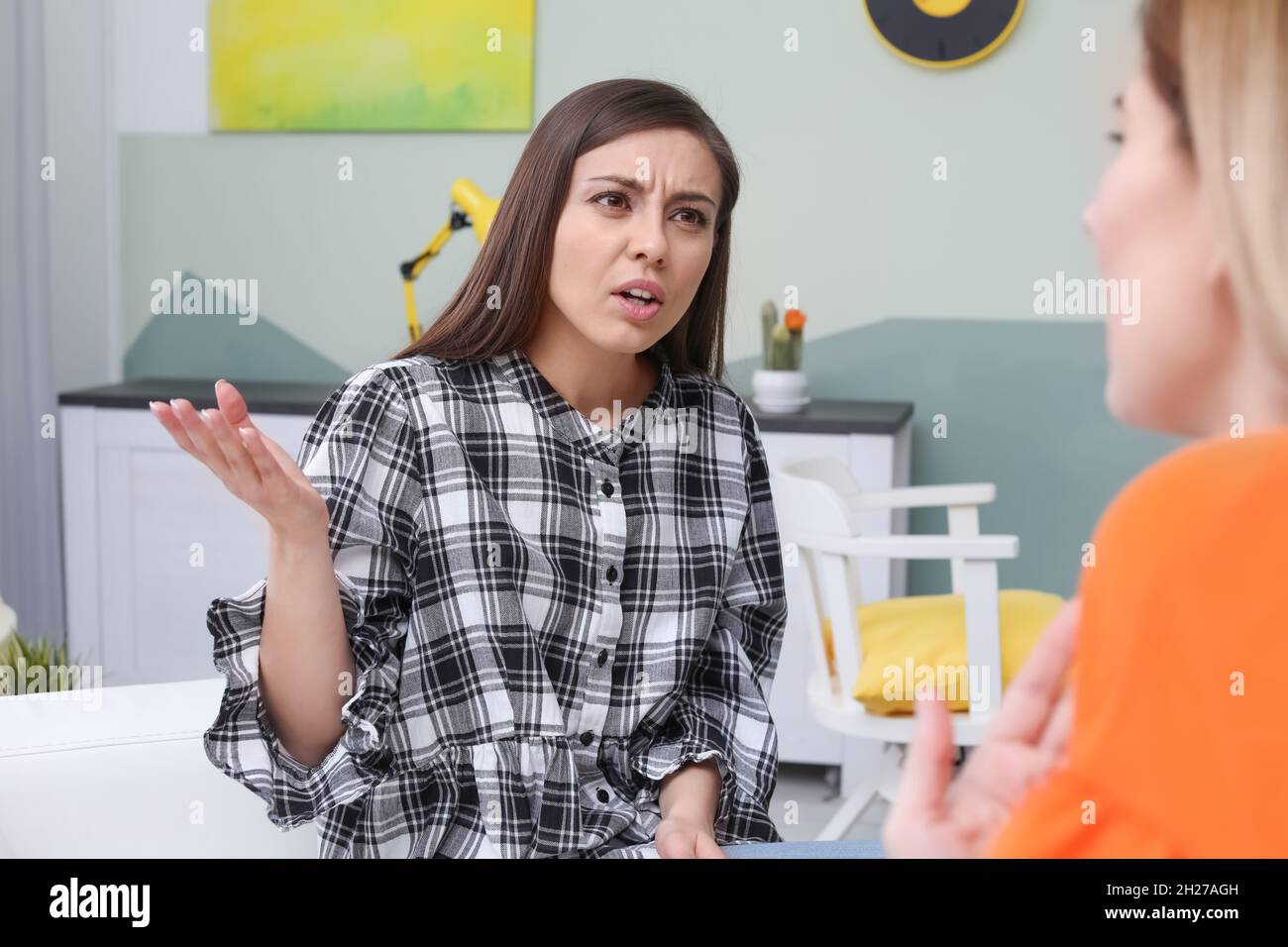 Women arguing at home Stock Photo - Alamy