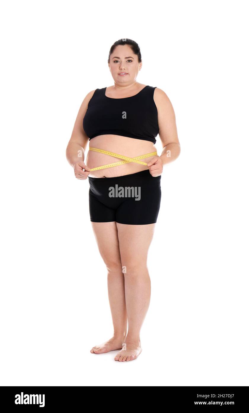 Full length portrait of fat woman with measuring tape on white ...