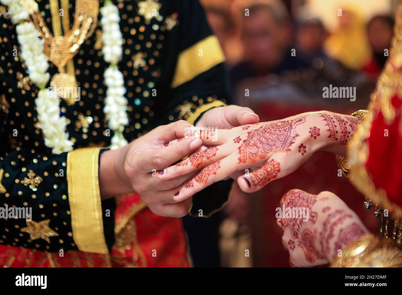 Muslim Indian Bride And Groom Holding Hands