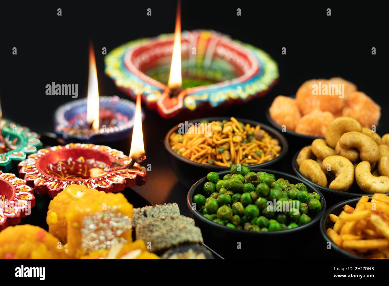 Salted Crispy Masala Namkeen Snacks And Sweet Mithai And Diya Deep Or ...
