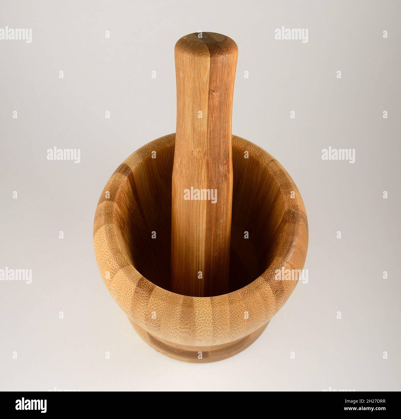 wooden mortar and pestle on white background Stock Photo - Alamy