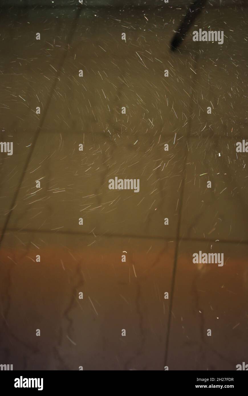 Dust shot against the light with a slow shutter speed Stock Photo - Alamy