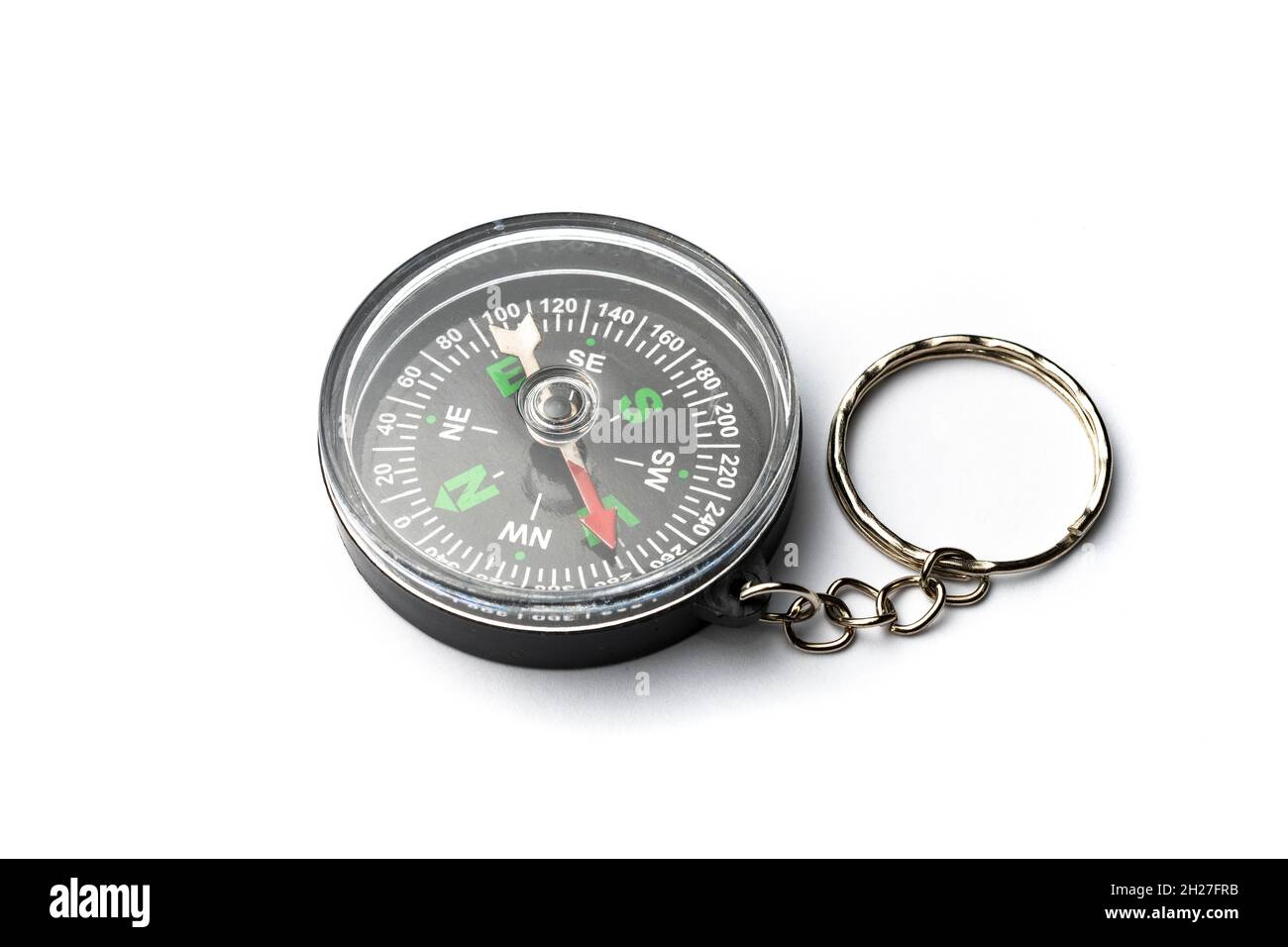 Keychain compass isolated on white background Stock Photo - Alamy