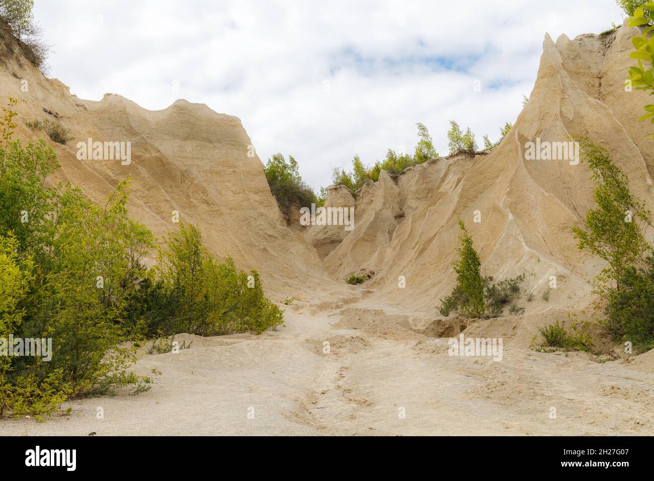 Abandoned Rummu quarry, Estonia. Former prison and sandy hills Stock ...