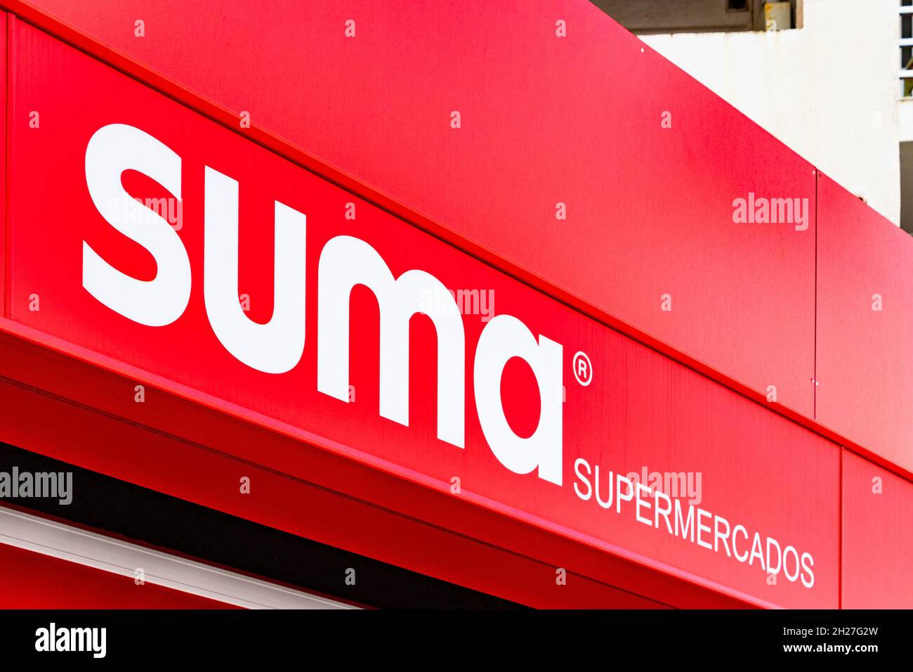 shop sign and logo for Suma supermercado supermarket in Can Pastilla ...