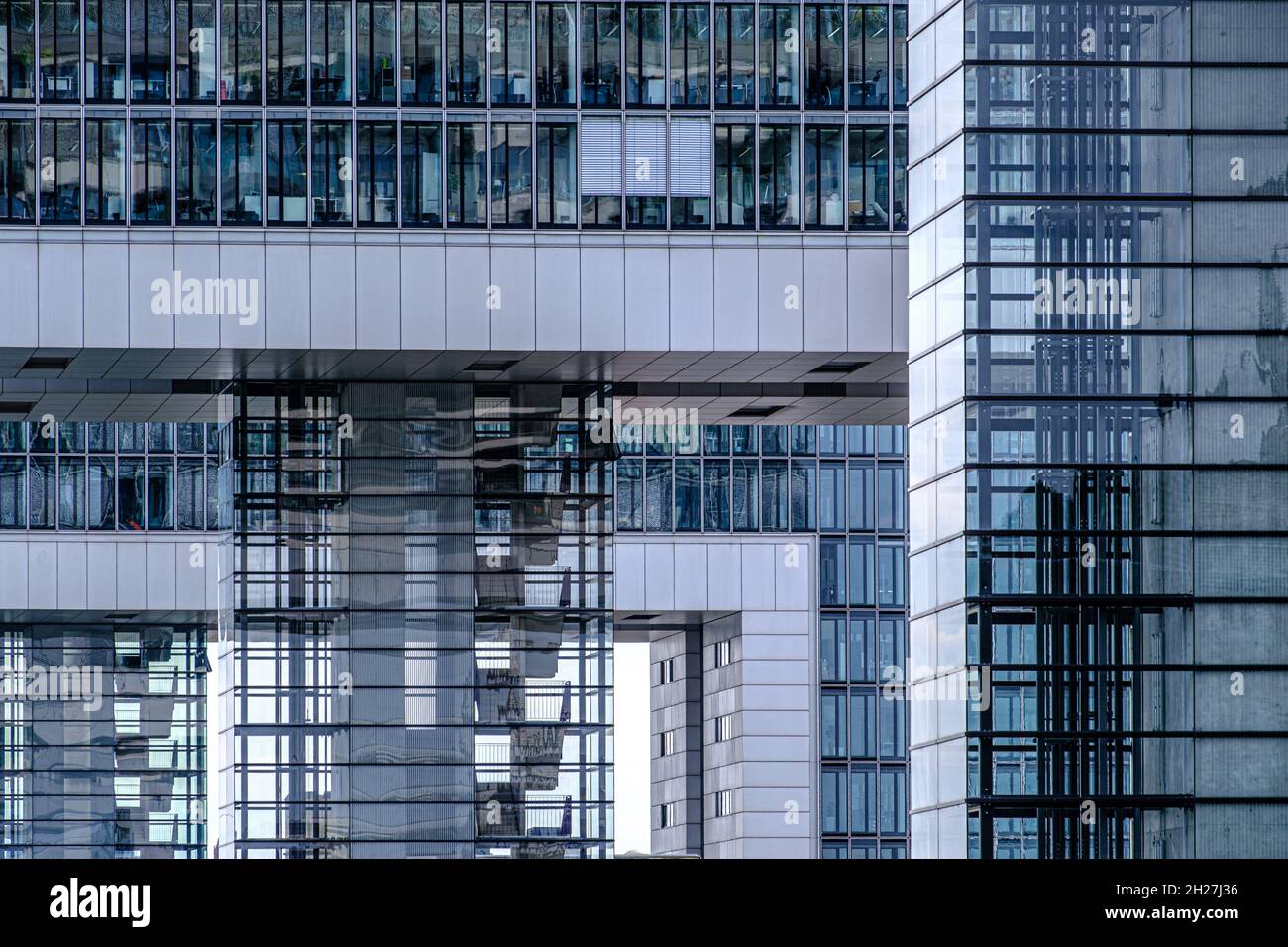 Multi-story glass building; modern architecture in Rheinau-Hafen ...