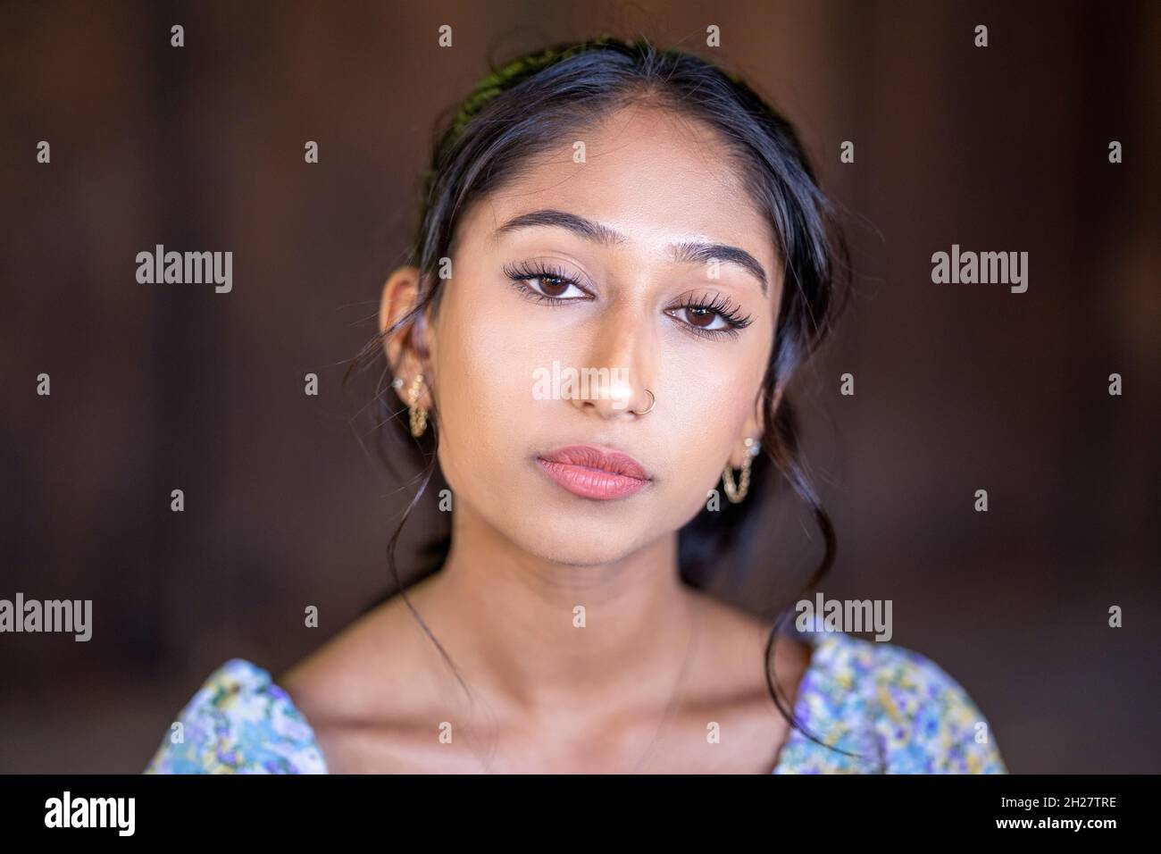 Closeups of a Young Multiracial Woman Seated in a Japanese Garden ...