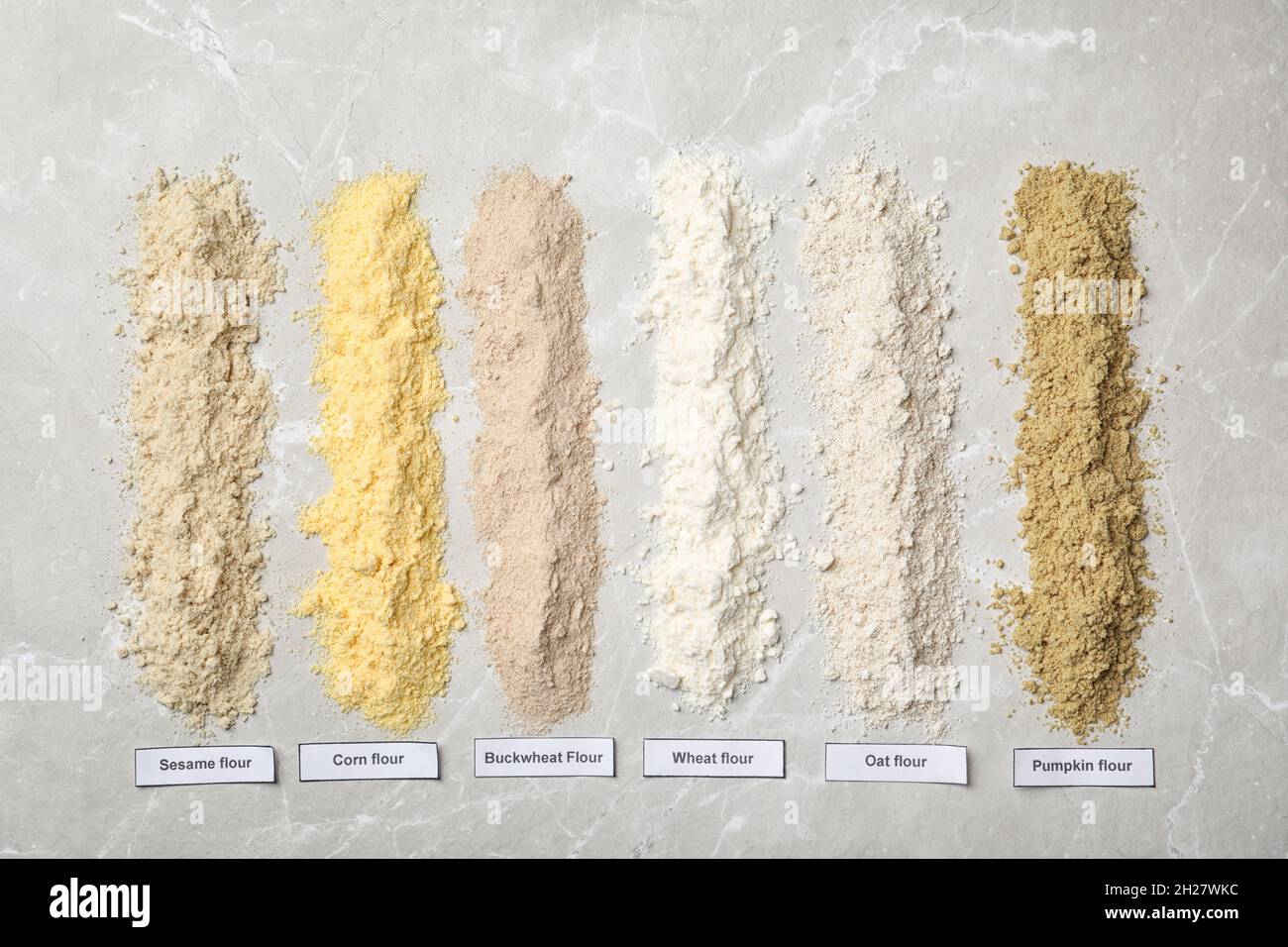 Composition with different types of flour on light background Stock ...