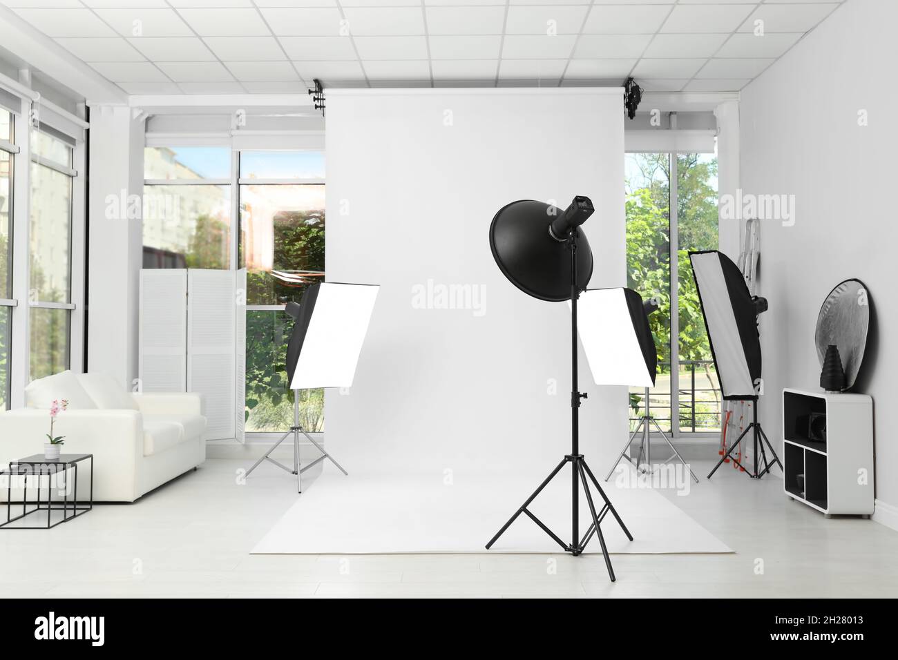 Interior of modern photo studio with professional equipment Stock Photo ...