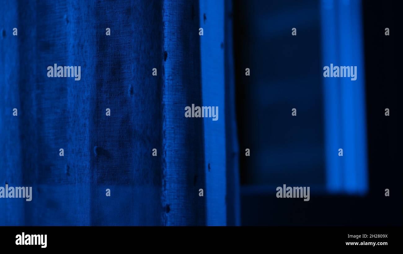 Blue window with light coming throw. Blue light Stock Photo - Alamy