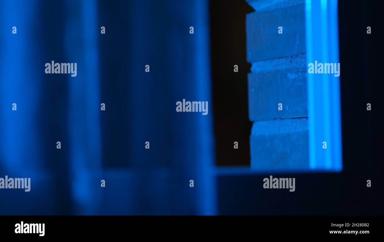 Blue window with light coming throw. Blue light Stock Photo - Alamy