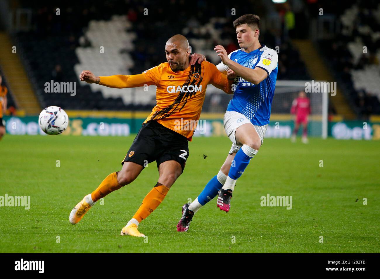 Josh Magennis #27 of Hull City and Ronnie Edwards #2 of Peterborough ...