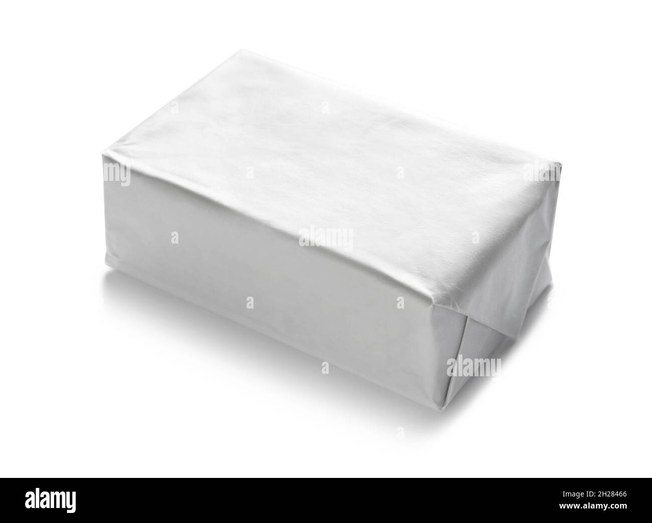 Block of butter in paper wrapper on white background Stock Photo - Alamy