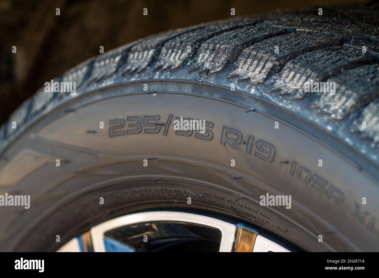 Close up view of tire with tire width, height and wheel diameter ...